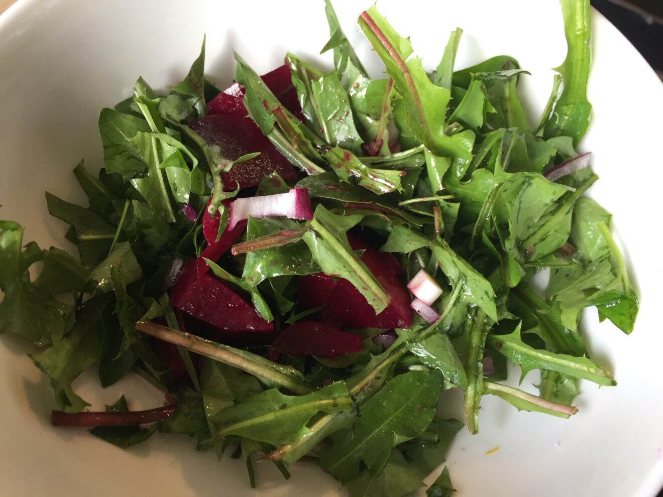 Eating Dandelions – The Grovestead